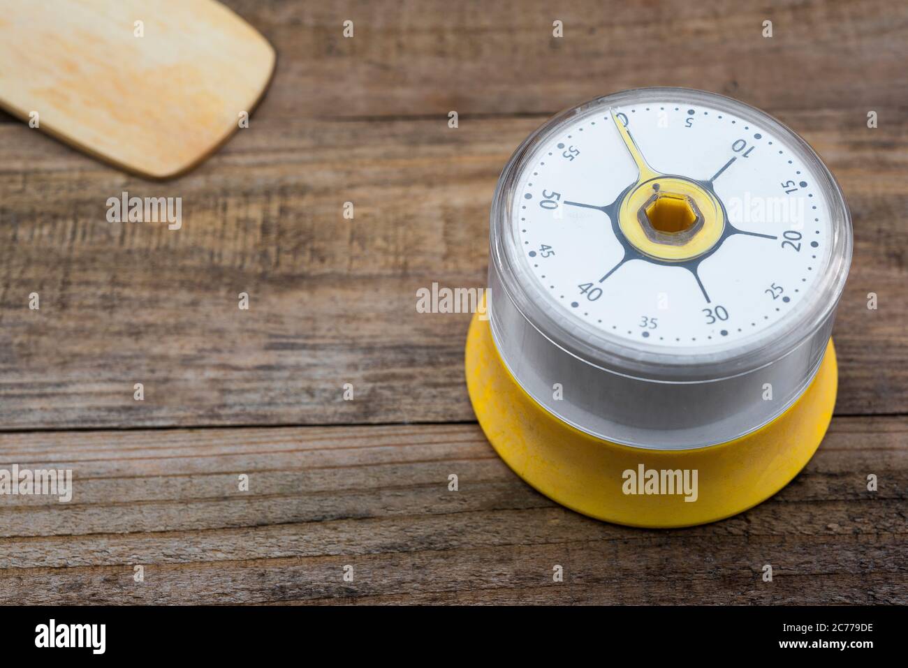 Bakery And Cooking Tools with kitchen timer on wood table Stock Photo ...