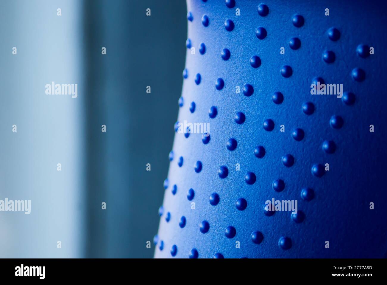 Texture of blue plastic with pimples closeup Stock Photo - Alamy