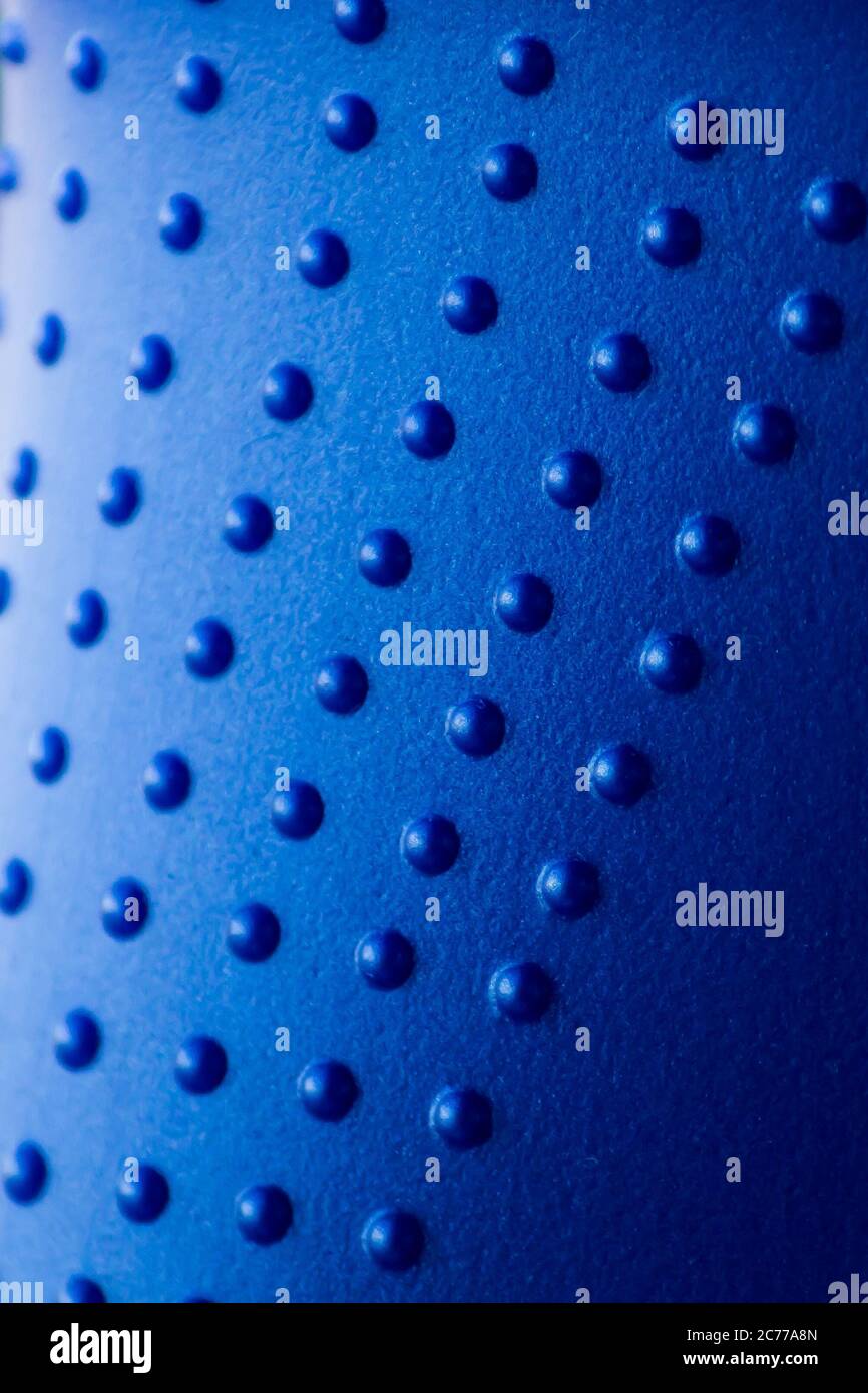 Texture of blue plastic with pimples closeup Stock Photo - Alamy