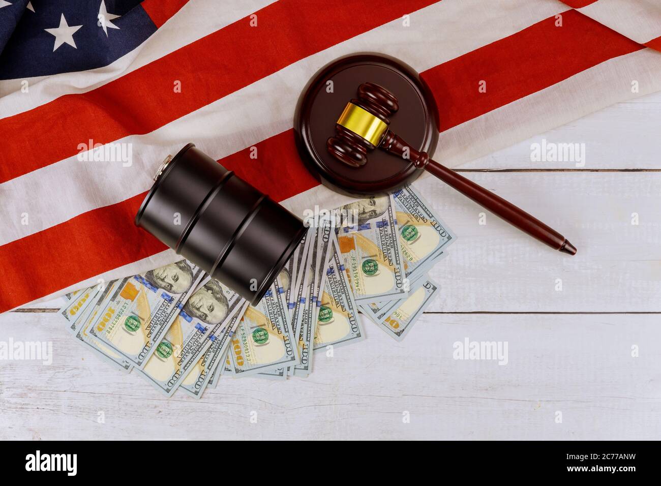 Wooden judge hammer concept sale of rising price of industry oil barrel ...
