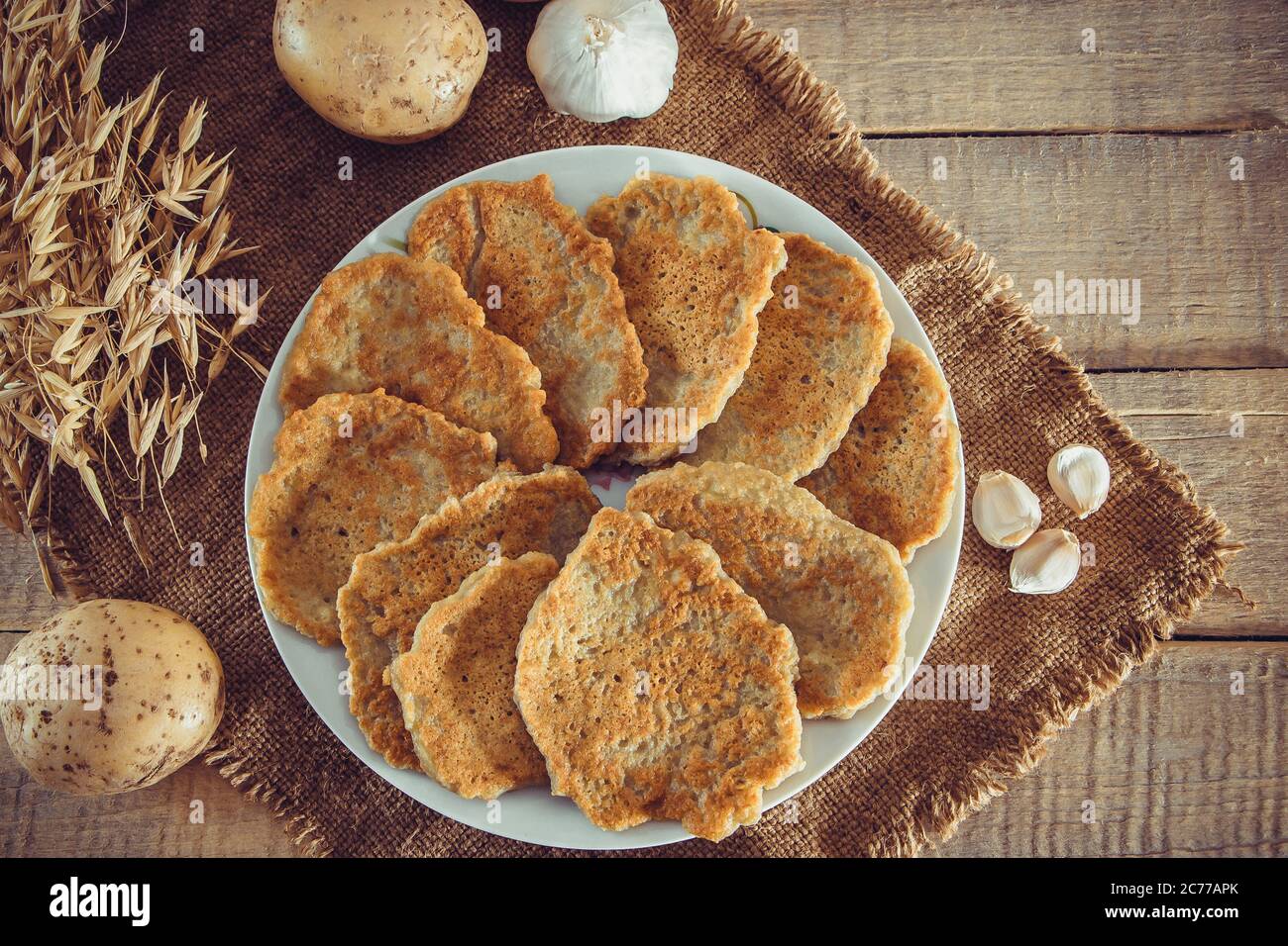 Potato pancakes - the national Ukrainian food "Draniki", flatlay Stock ...