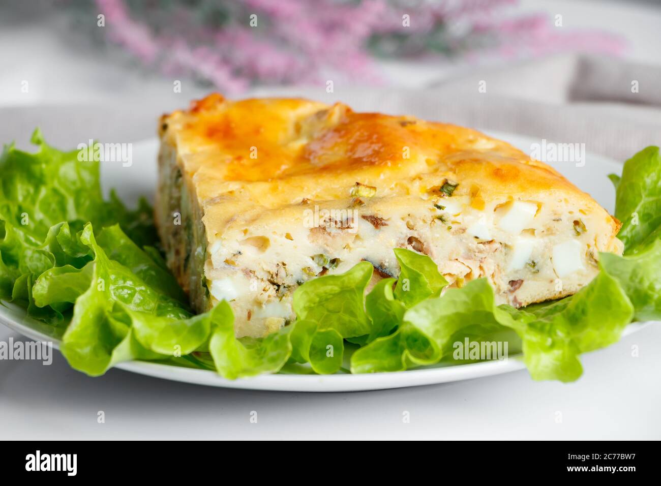 Delicious homemade fish pie with greens on a plate. Mediterranean dish ...