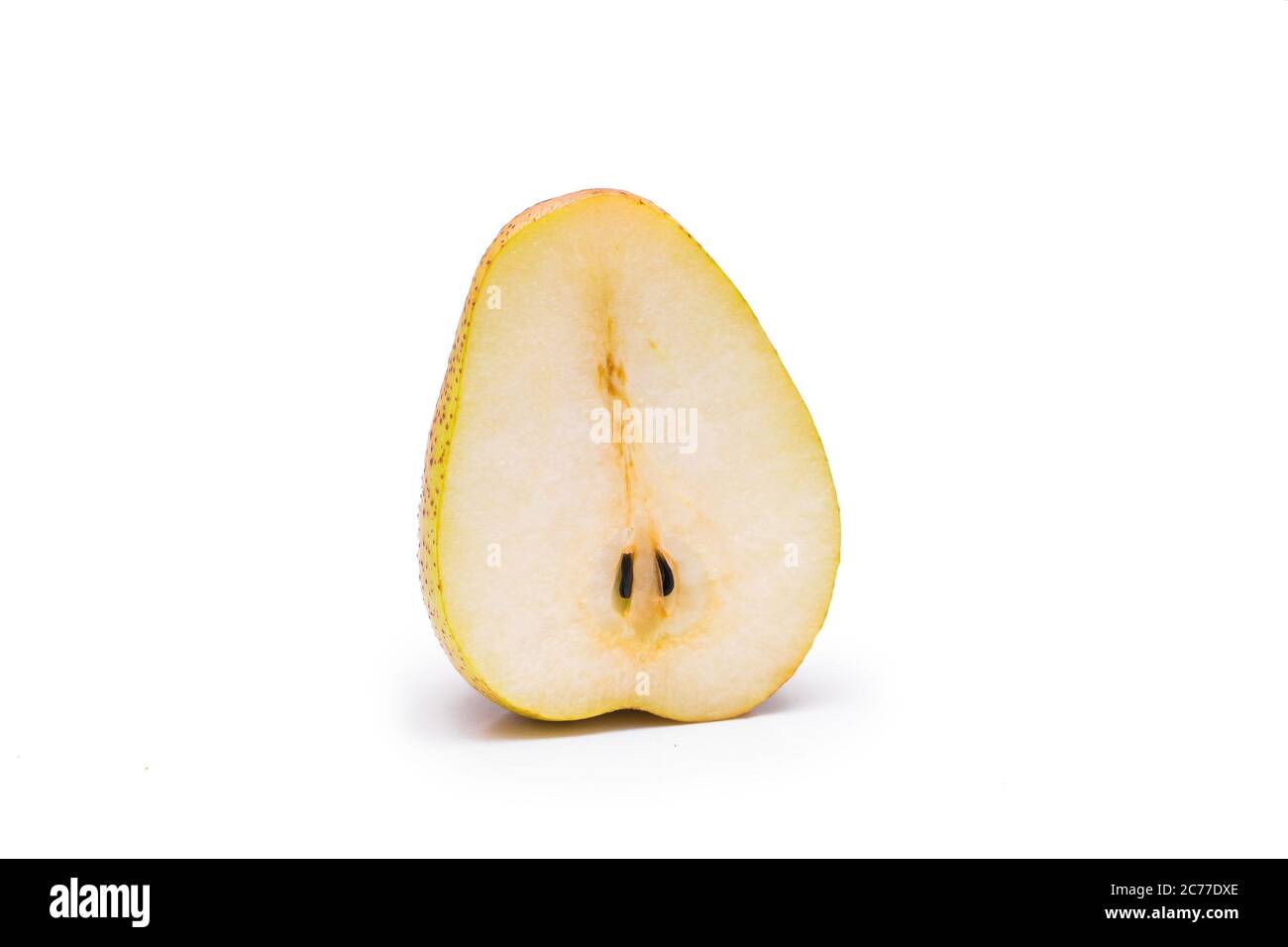 Pear cut in two isolated on a white background. Half pear closeup ...