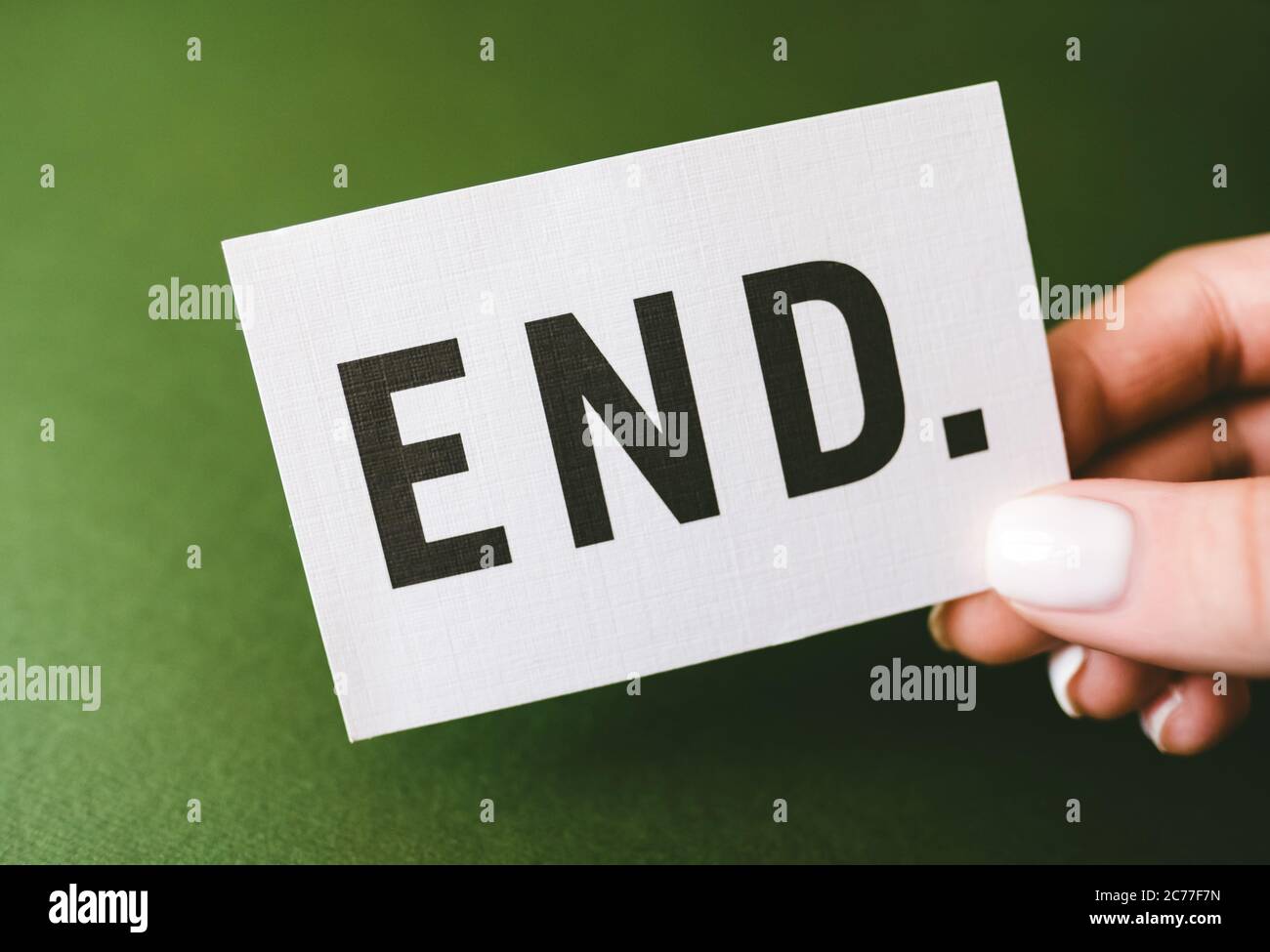 Hands holding END Stock Photo - Alamy