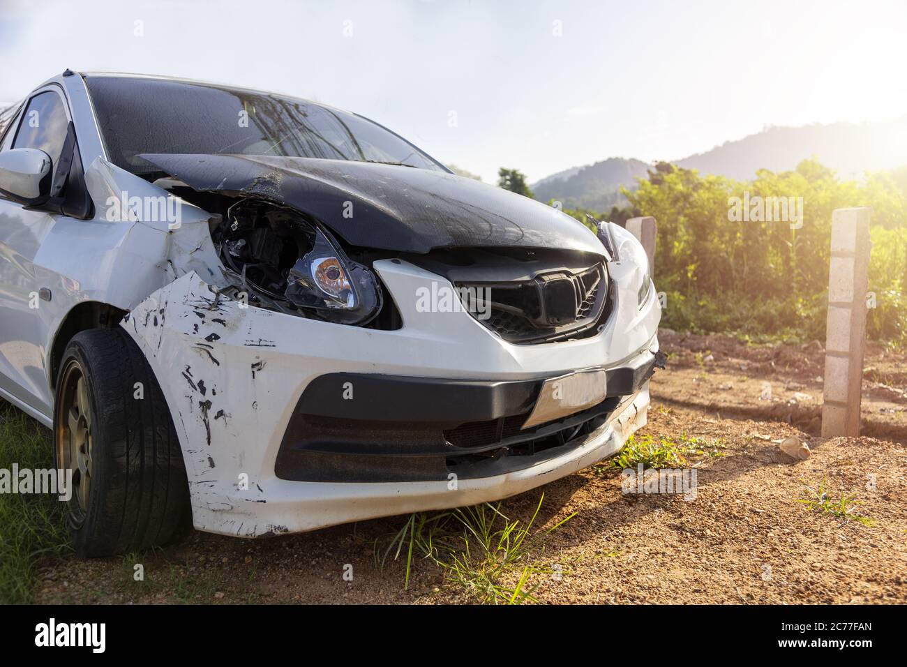 Front of white color car have damaged and broken by accident park on ...