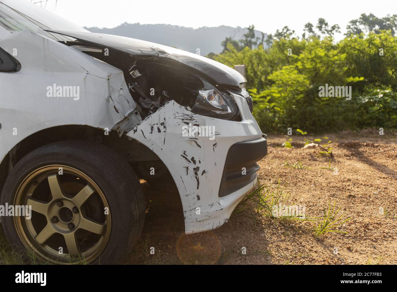 Front of white color car have damaged and broken by accident park on ...