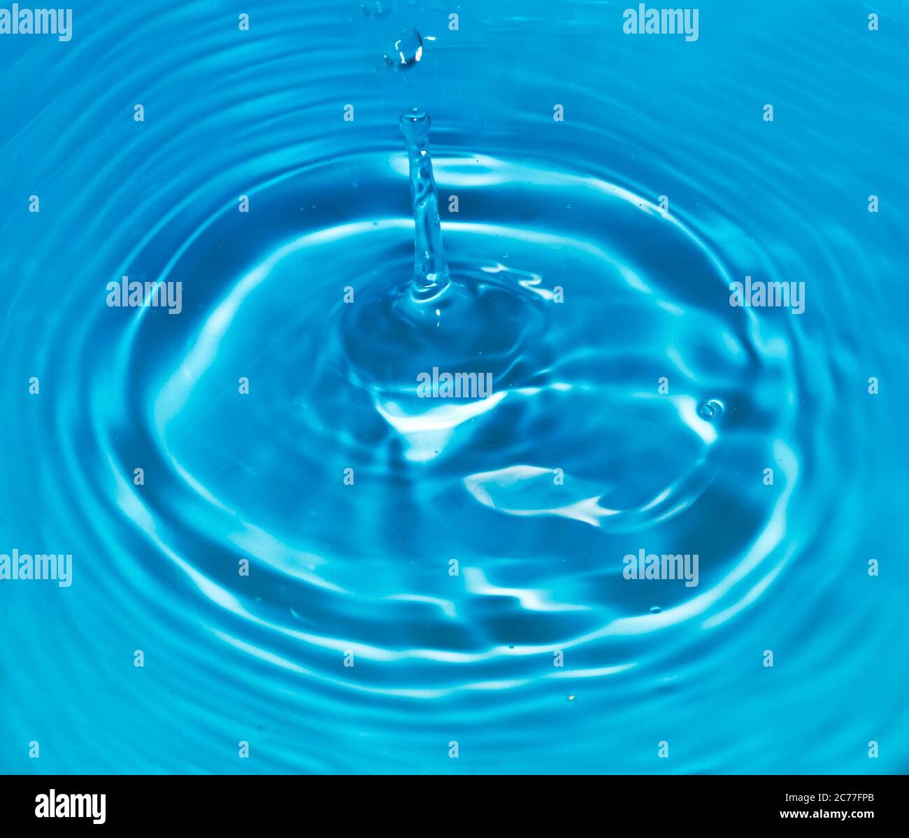 Close up water drop with water wave Stock Photo - Alamy