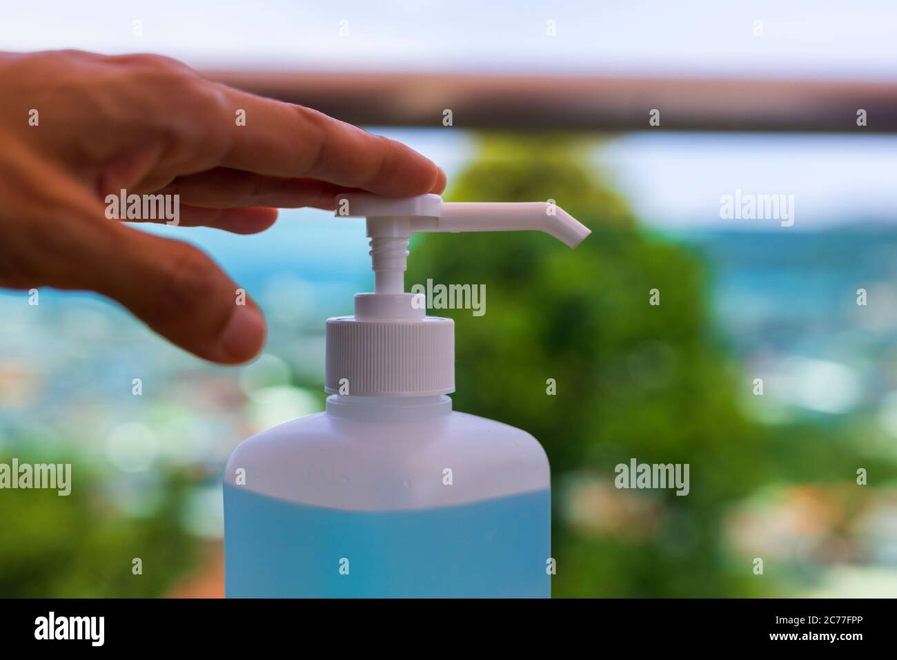 Close-up hand using hand alcohol sanitizer pump Stock Photo - Alamy