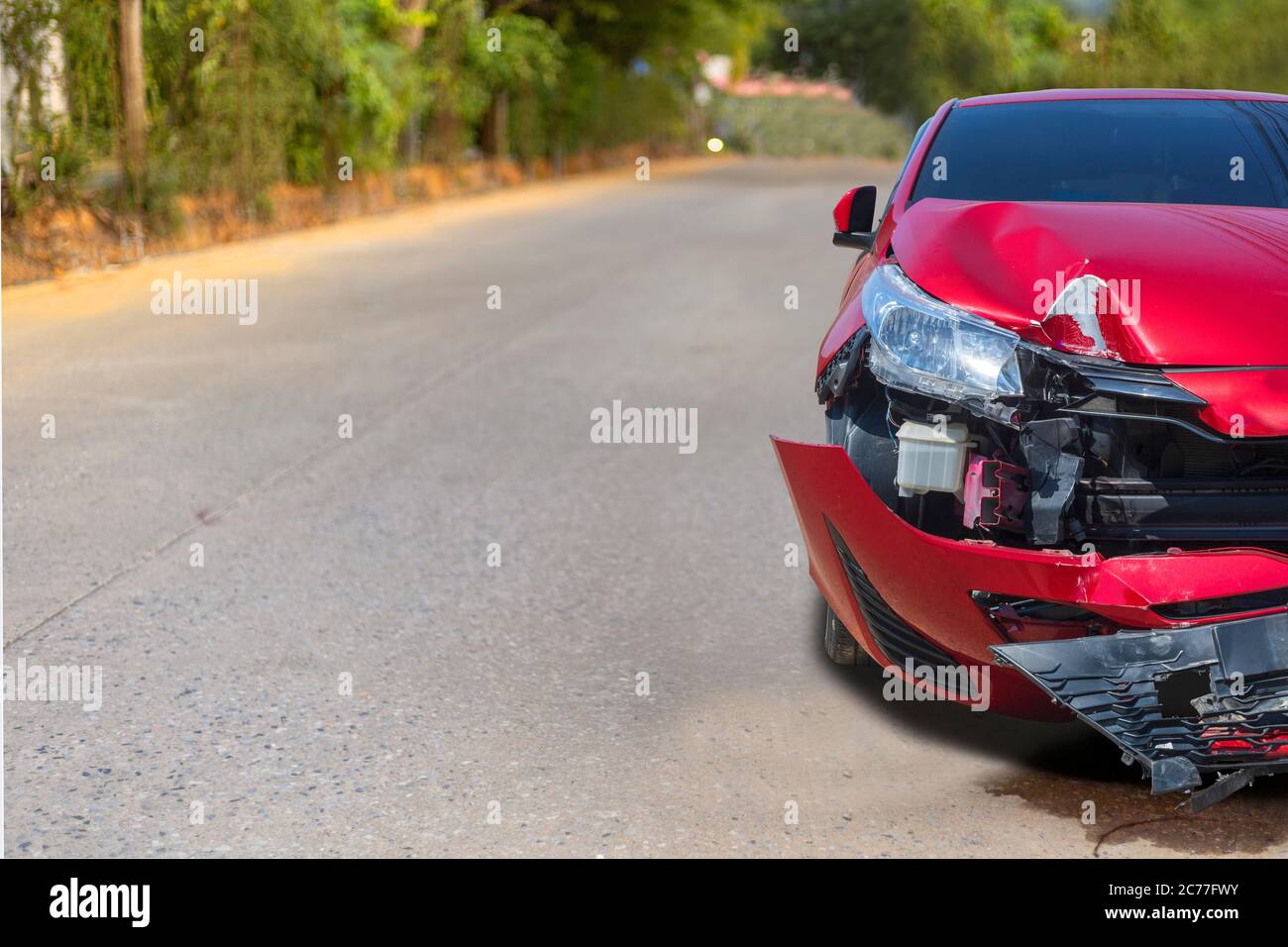Front of light red color car have big damaged and broken by accident on ...