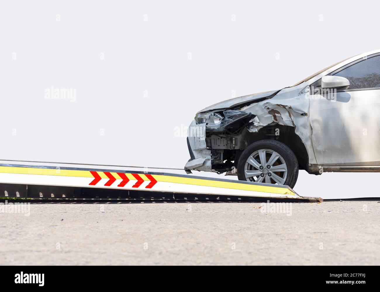 accident Car Slide on truck for move. Gray car have damage by accident ...