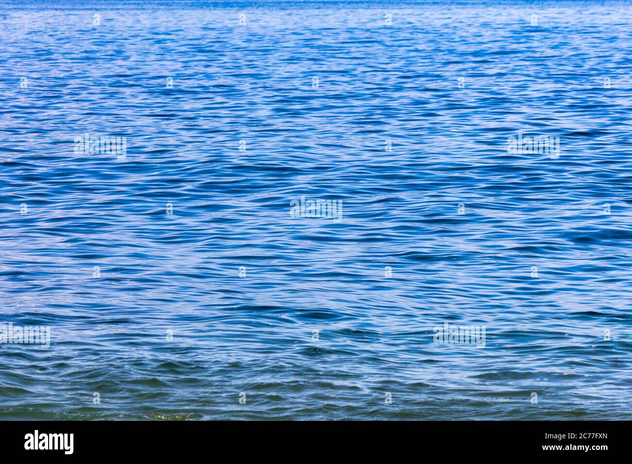 Blue sea water background. For text or design Stock Photo - Alamy