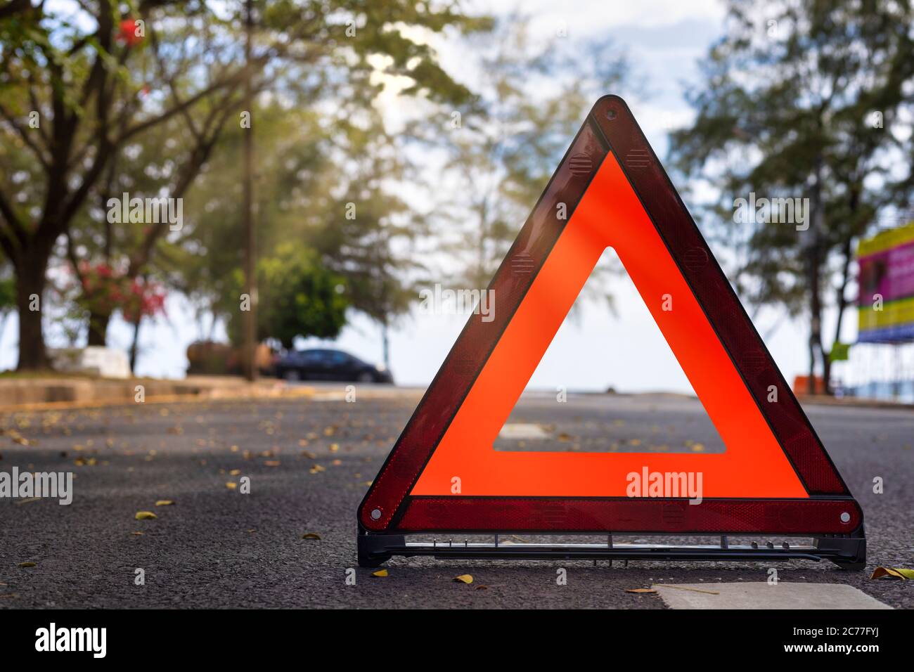 Red triangle, red emergency stop sign, red emergency symbol on road ...