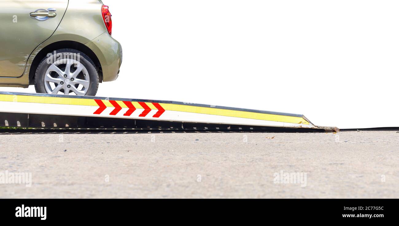 accident Car Slide on truck for move. Green car have damage by accident ...