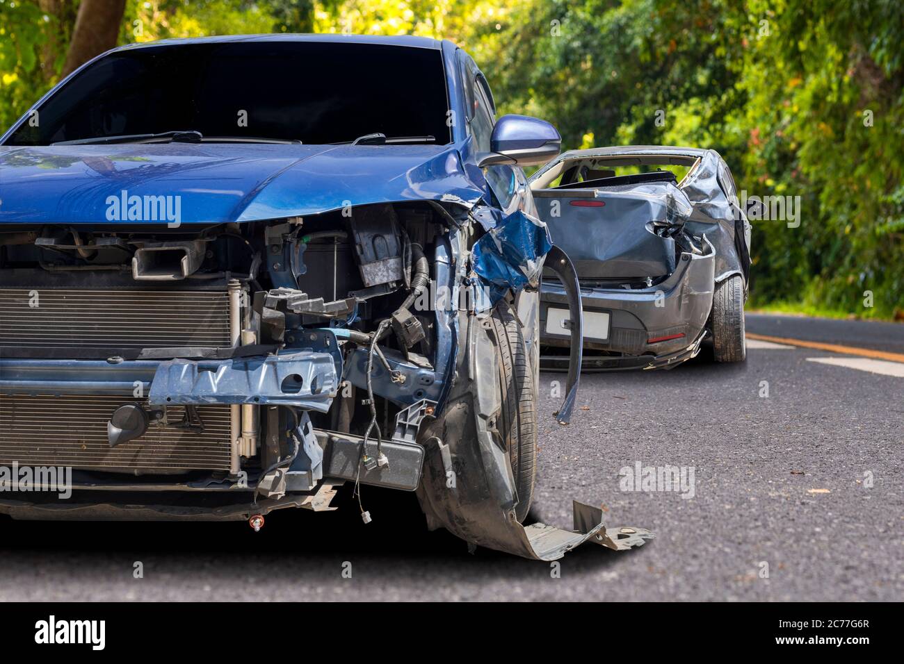 Front of blue color car crash with black car have big damaged and ...