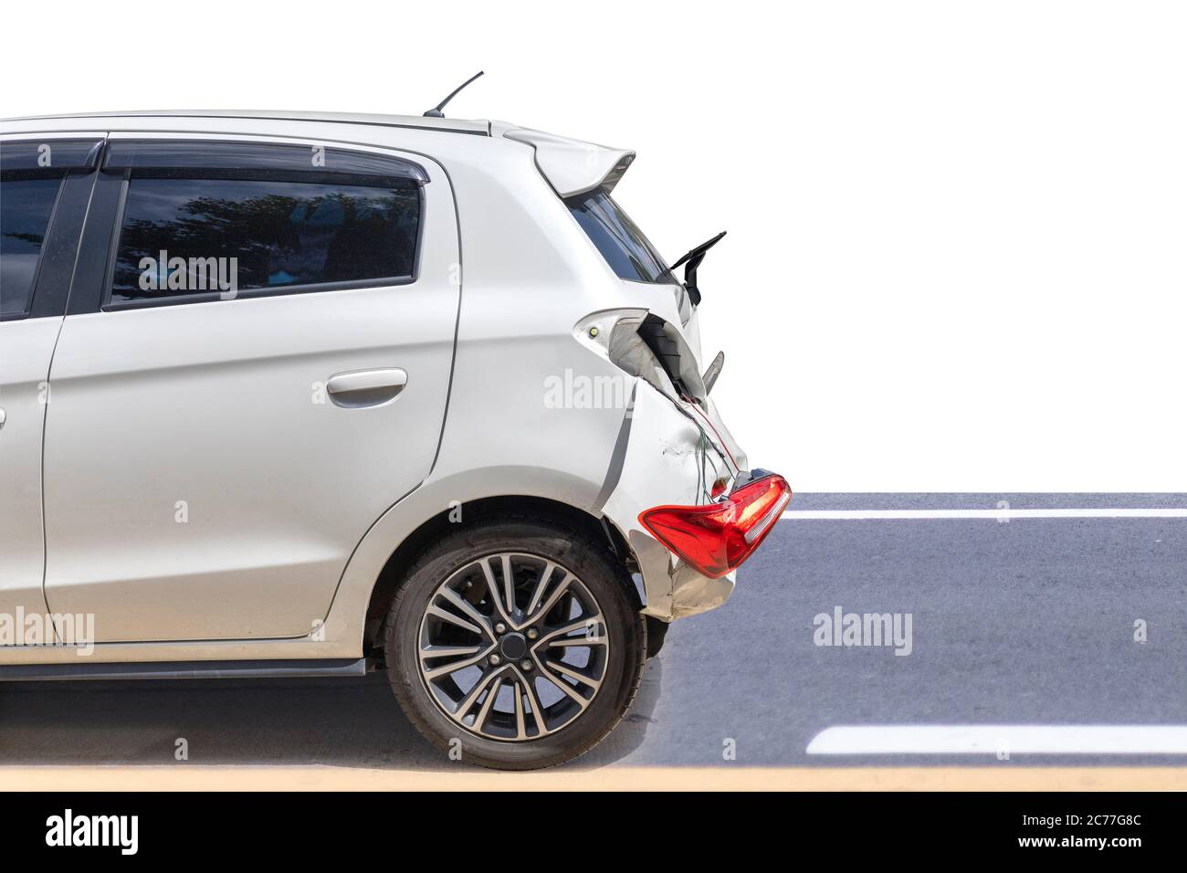 Back side of white color car big damaged and broken by accident on road ...