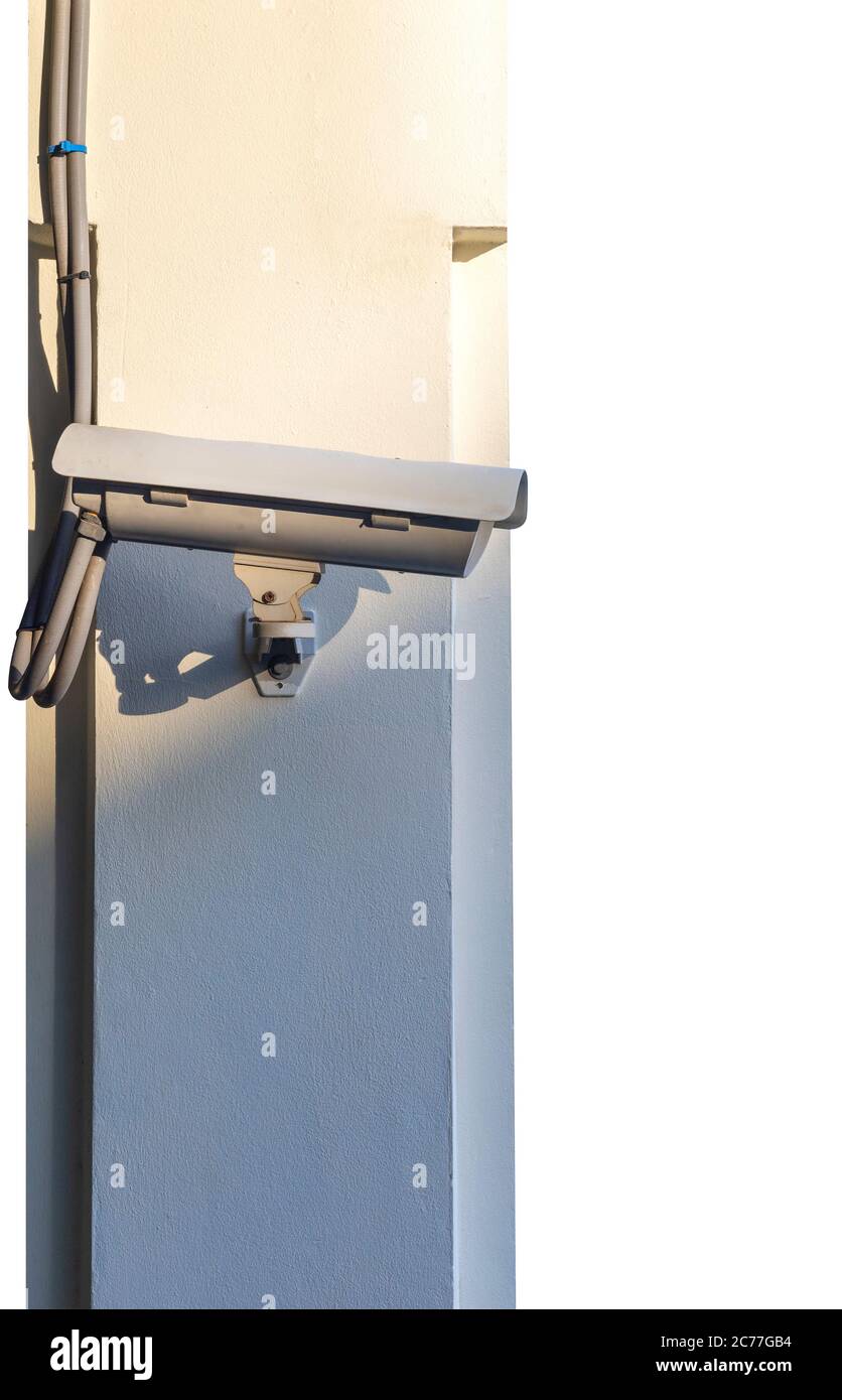 CCTV camera on wall isolated on white background Stock Photo - Alamy