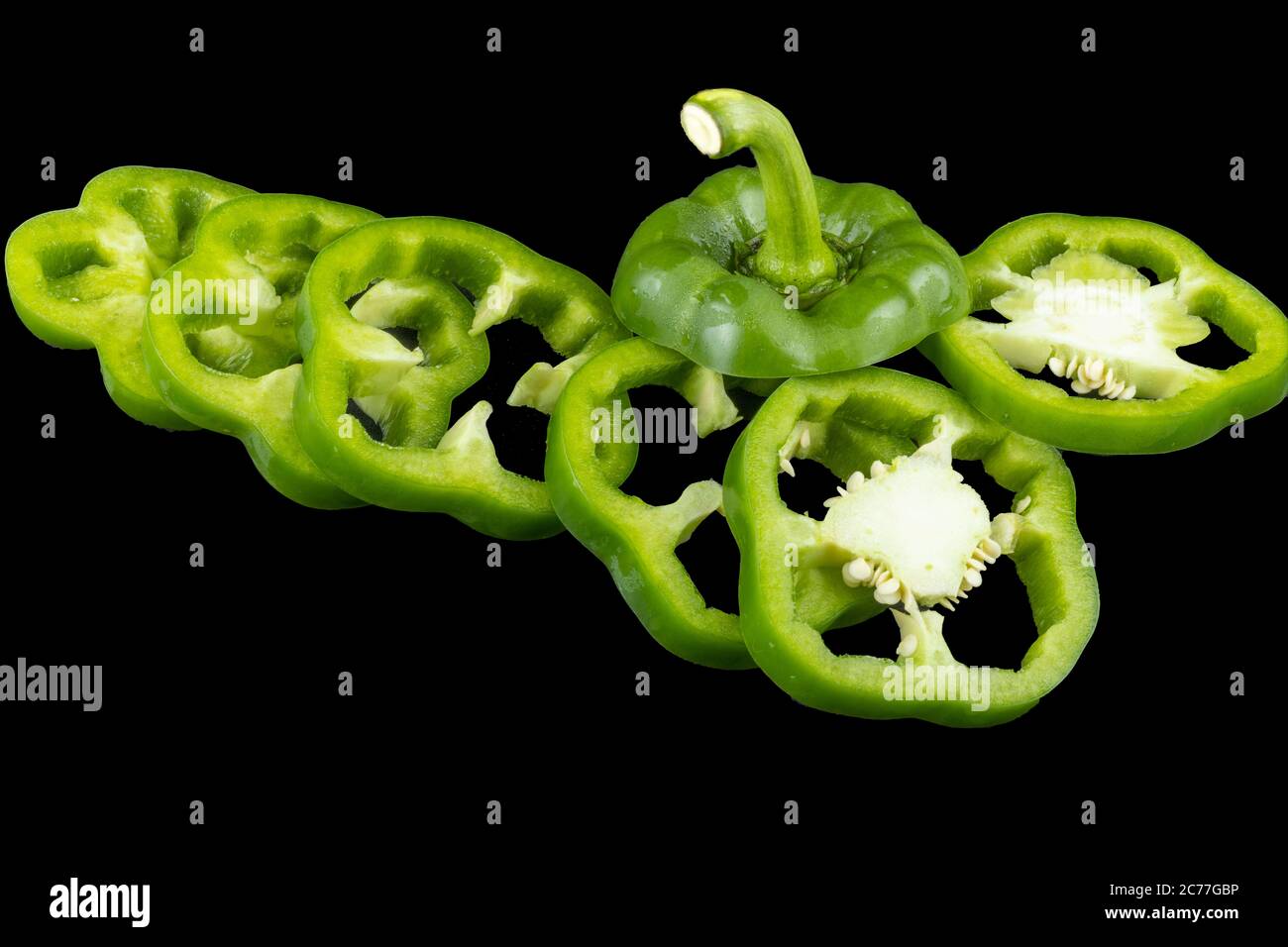 Slide fresh green bell pepper. Sweet pepper. Giant pepper. Isolate on ...