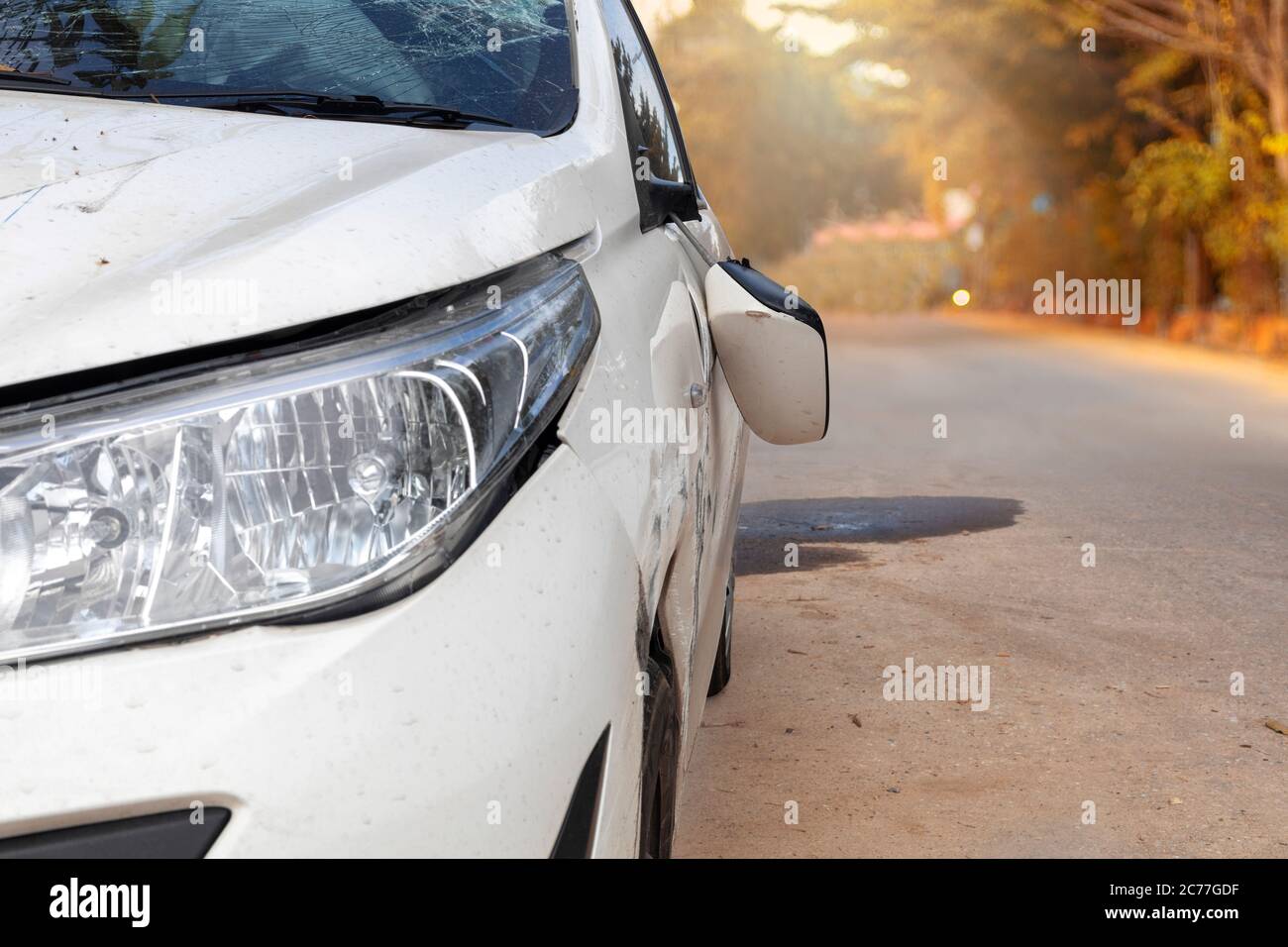 Car accident on road car door and rearview mirror broken. Front of ...