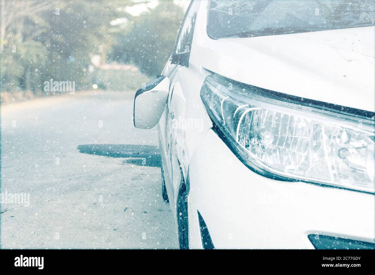 Car accident on winter road car door and rearview mirror broken. Front ...