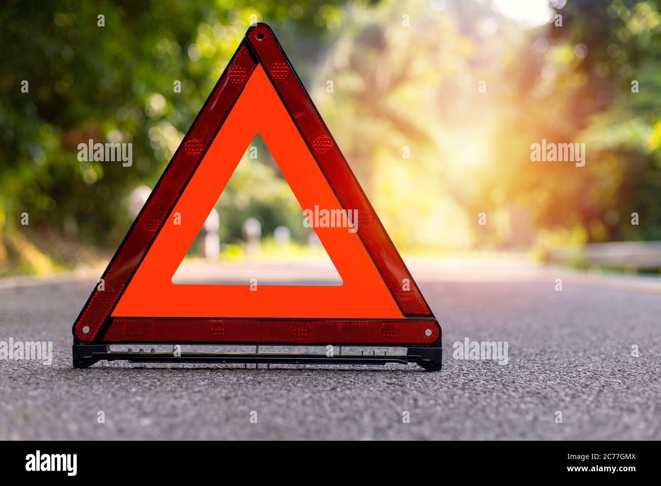 Red triangle, red emergency stop sign, red emergency symbol on road ...