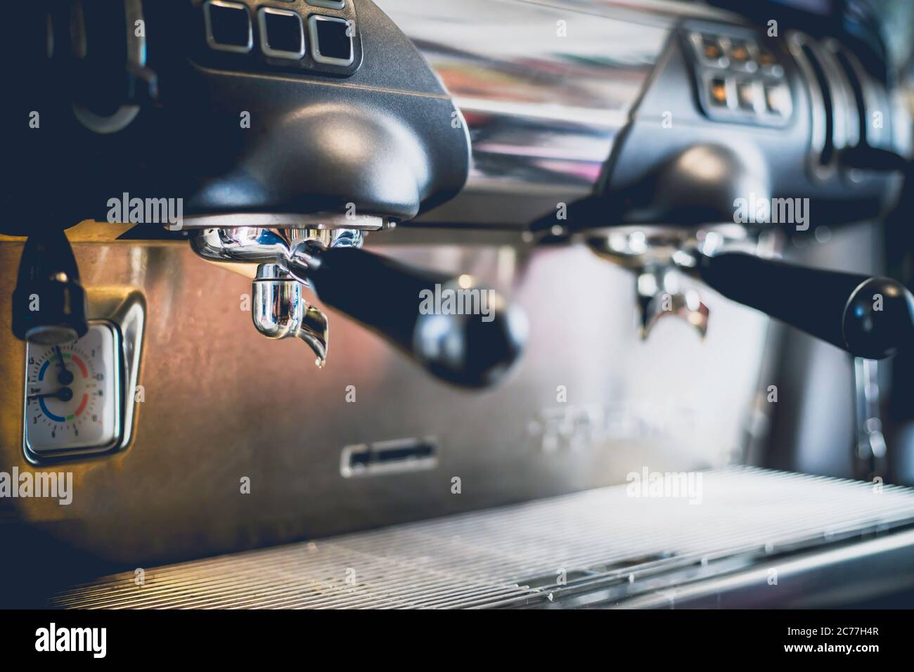 Close-Up of coffee machine in the coffee shop. len blur effect. Process ...