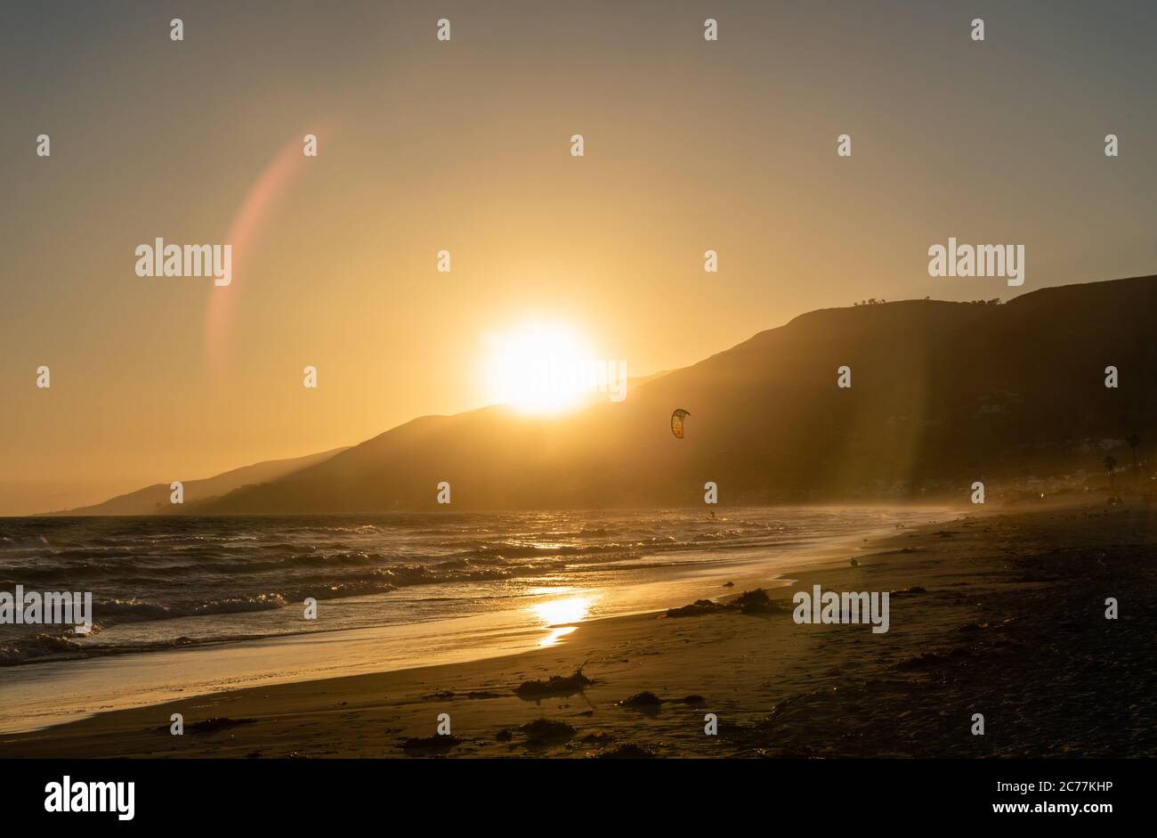 Kite surfing at sunset at Zuma beach, Malibu, Southern California Stock ...