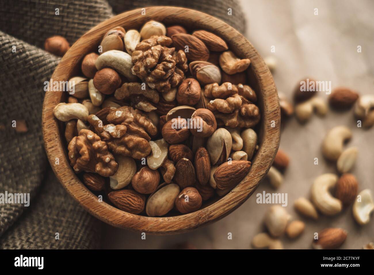 Different types of nuts, nut mix of almonds, hazelnuts, cashews ...