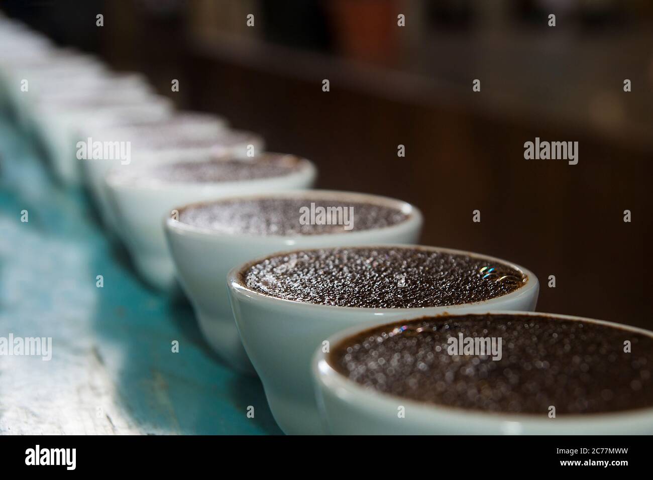 Coffee cupping made by barista to evaluate quality Stock Photo - Alamy