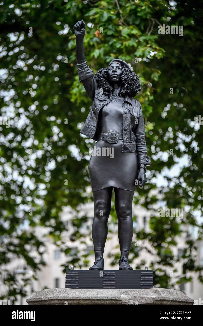 A black resin and steel statue titled A Surge of Power (Jen Reid) 2020 ...