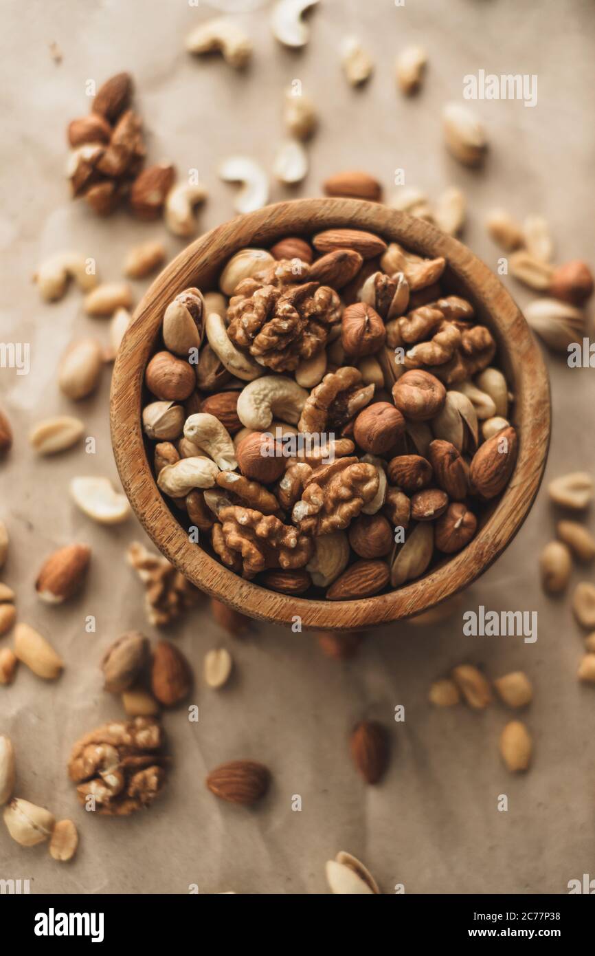 Different types of nuts, nut mix of almonds, hazelnuts, cashews ...