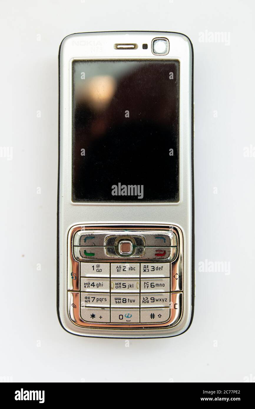 old push-button smartphone on white background Stock Photo - Alamy