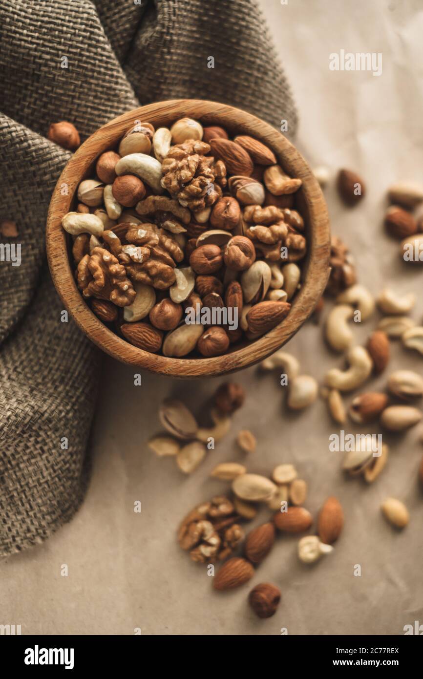 Different types of nuts, nut mix of almonds, hazelnuts, cashews ...