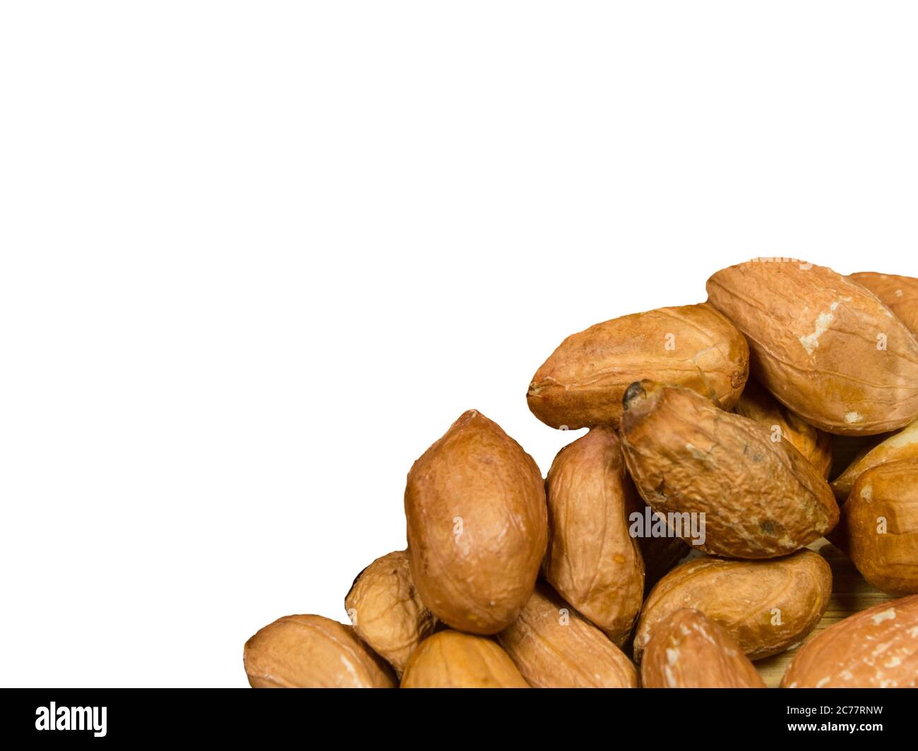 Scattered nuts. Isolated on white Stock Photo - Alamy