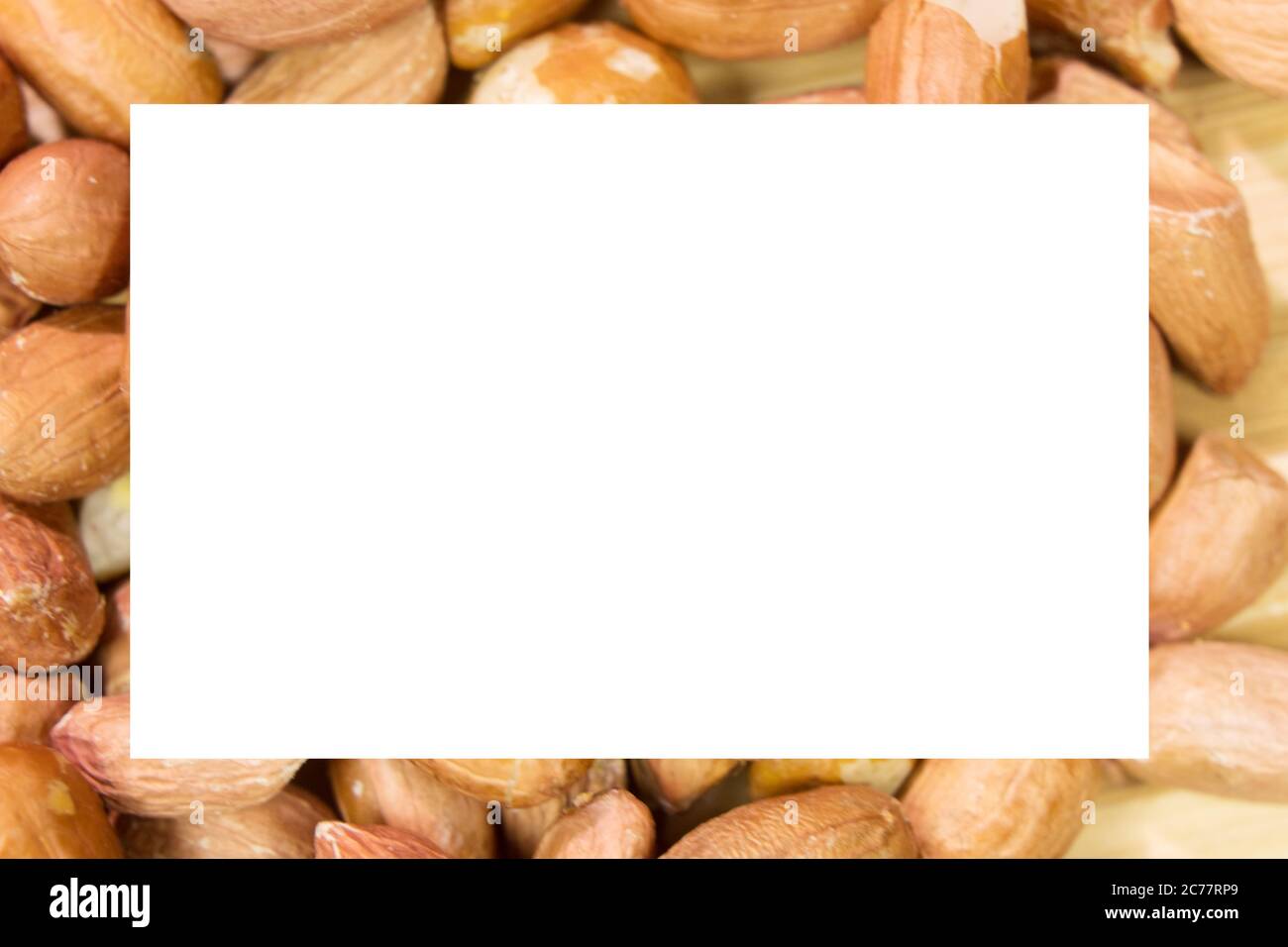 Isolated peanut. Walnut purified on a wooden background. Protein food ...