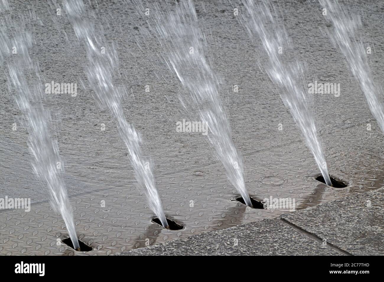 water fountains from ground level fountain installation Stock Photo - Alamy