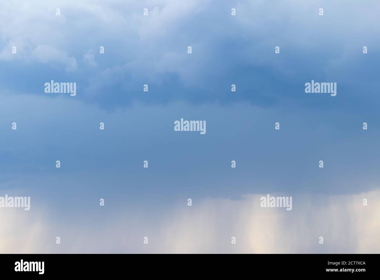 Cloud with rain coming out of it. Overcast weather. Abstract background ...