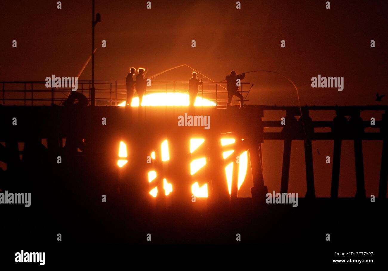 Fishermen on blyth pier hi-res stock photography and images - Alamy