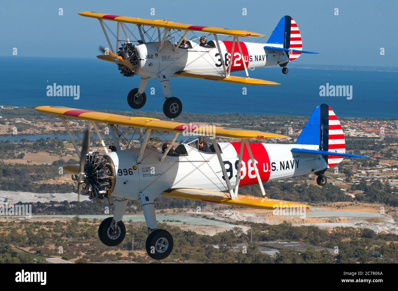 An air to air portrait of two restored 1940's US Navy Boeing N2S ...