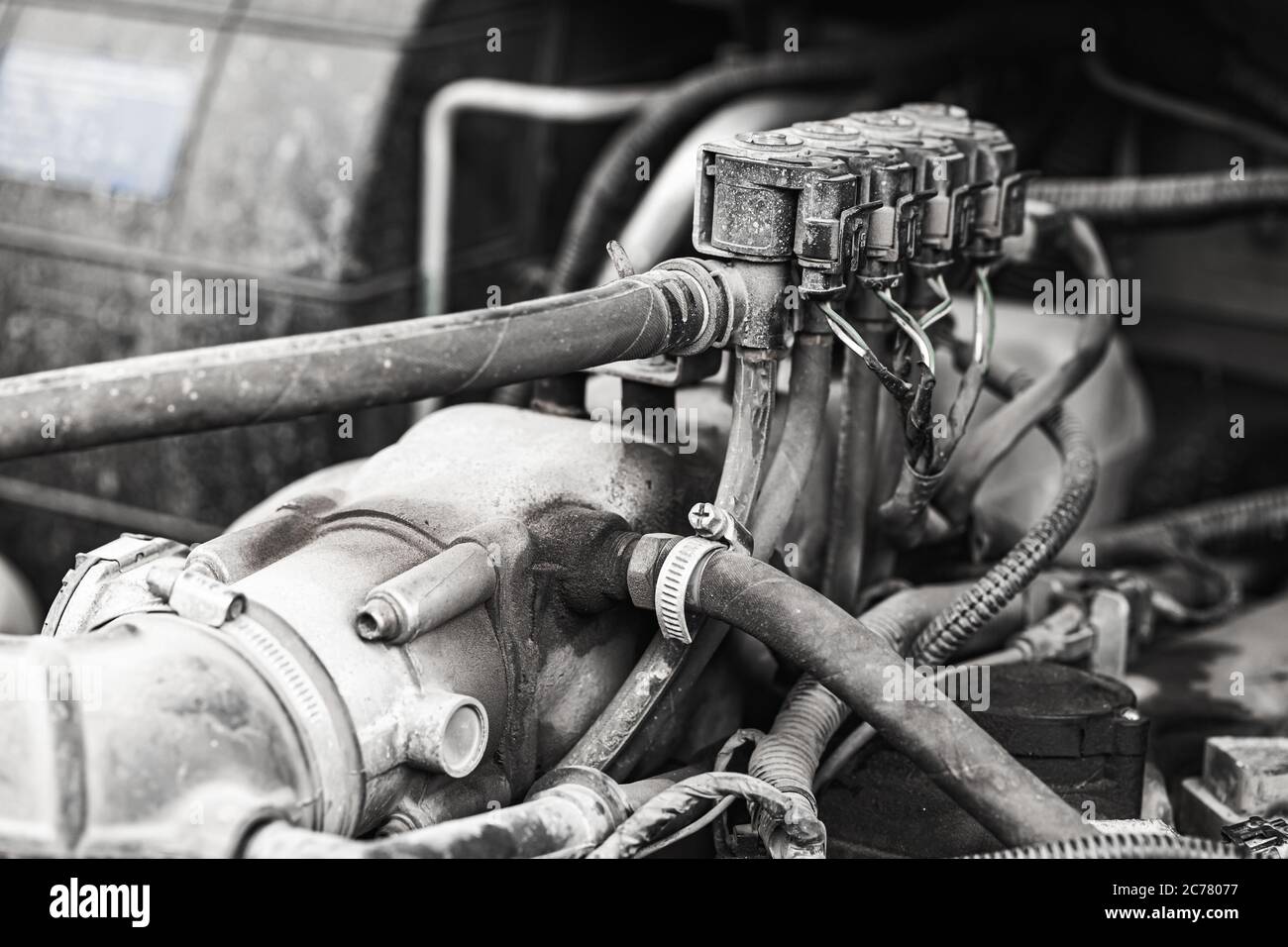 Gas fuel system, motor parts of a SUV hybrid car, gas nozzles close-up ...