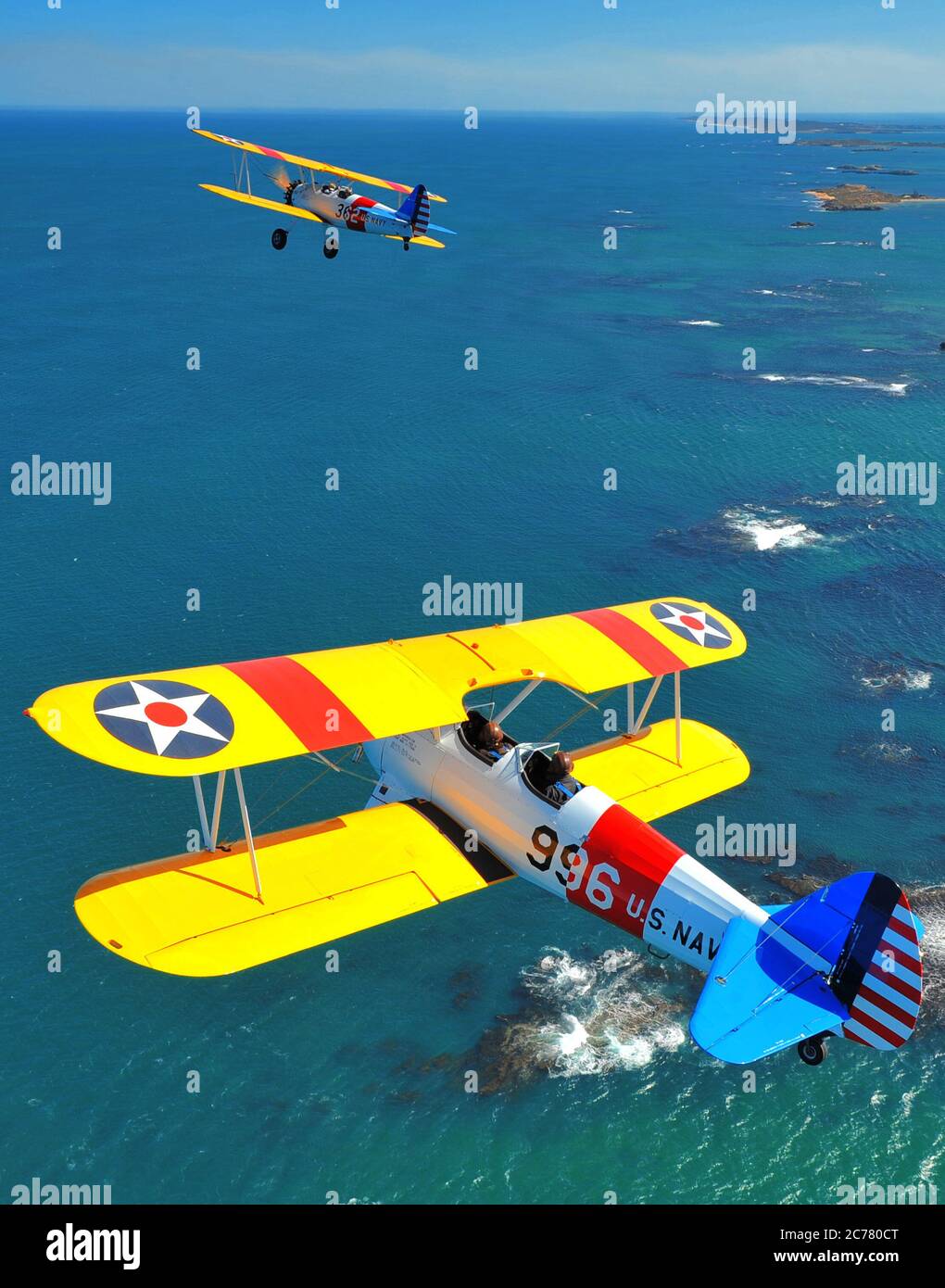 An air to air portrait view of two restored 1940's US Navy Boeing ...