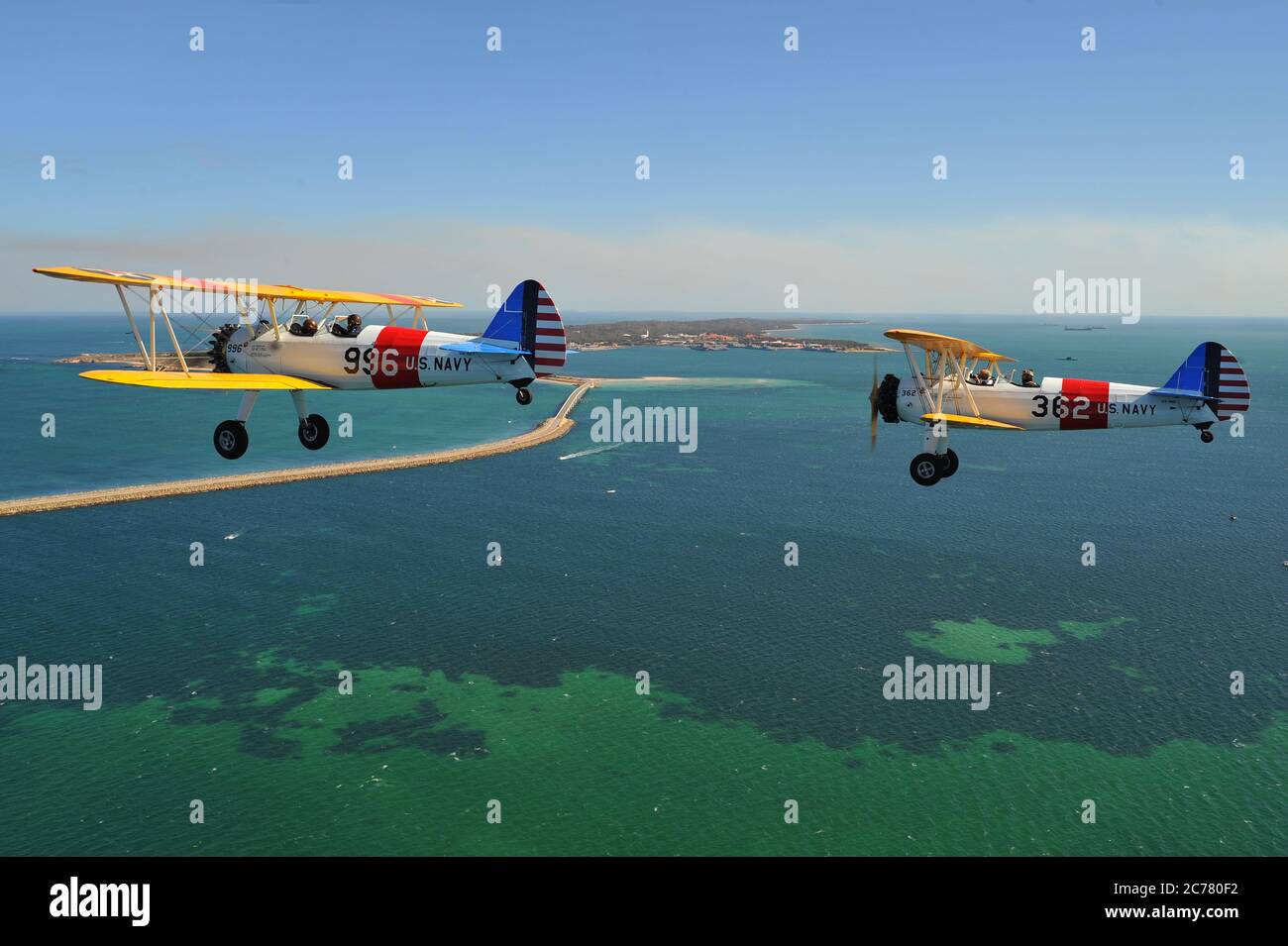 An air to air portrait of two restored 1940's US Navy Boeing Stearman ...