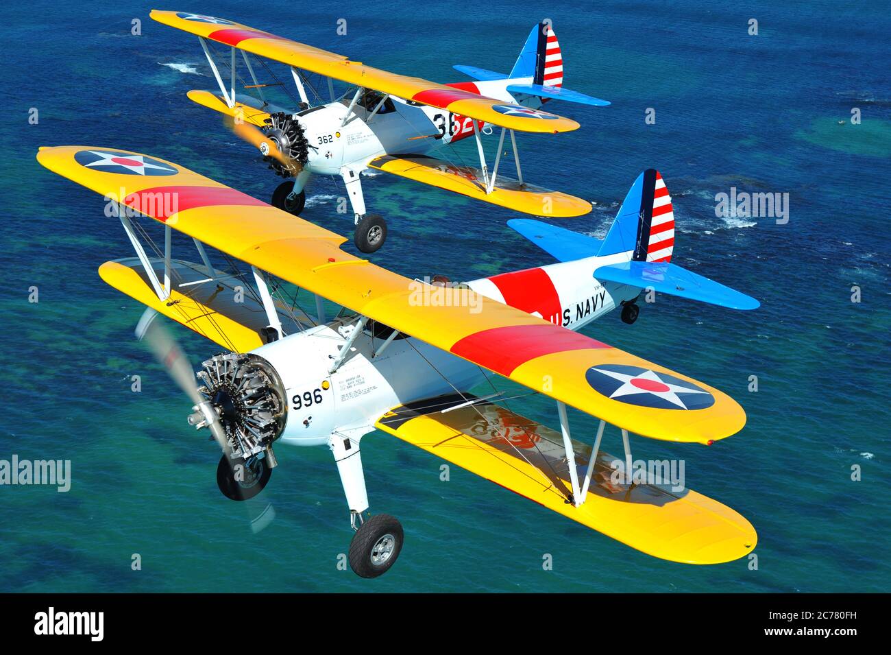 An air to air portrait of two restored 1940's US Navy Boeing Stearman ...