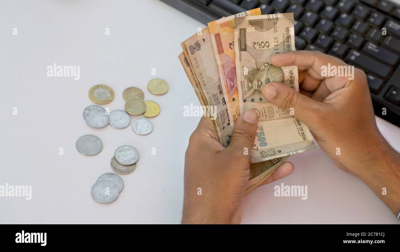 Counting Money India High Resolution Stock Photography and Images - Alamy