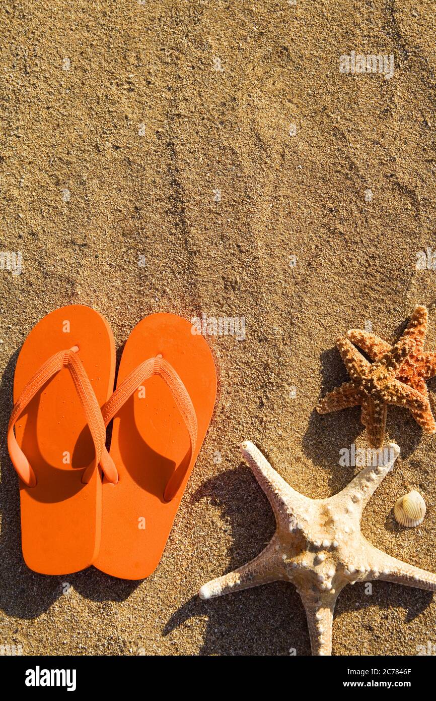 Beach items on sand Stock Photo - Alamy