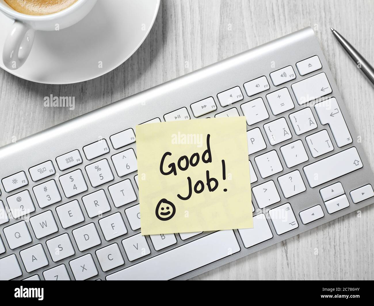 Good job message on desk Stock Photo - Alamy