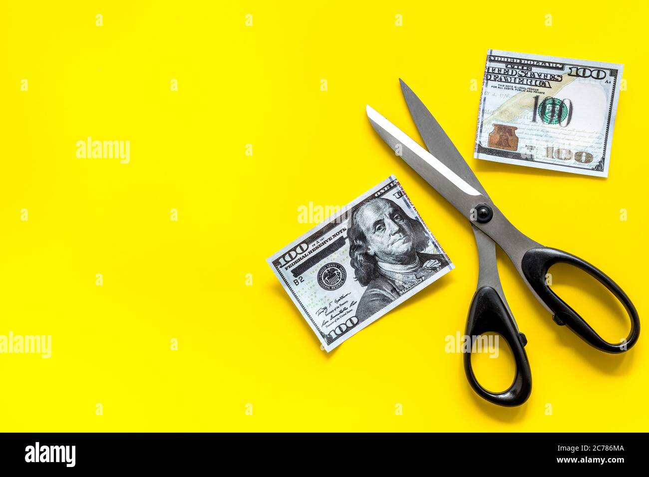 Decline of dollar exchange rate. Scissors cut dollars banknote Stock ...