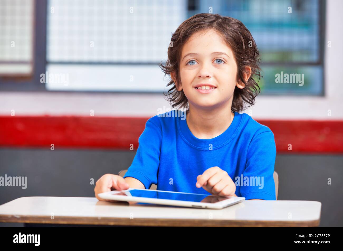 Elementary school scene. Caucasian schoolboy in the classroom Stock ...