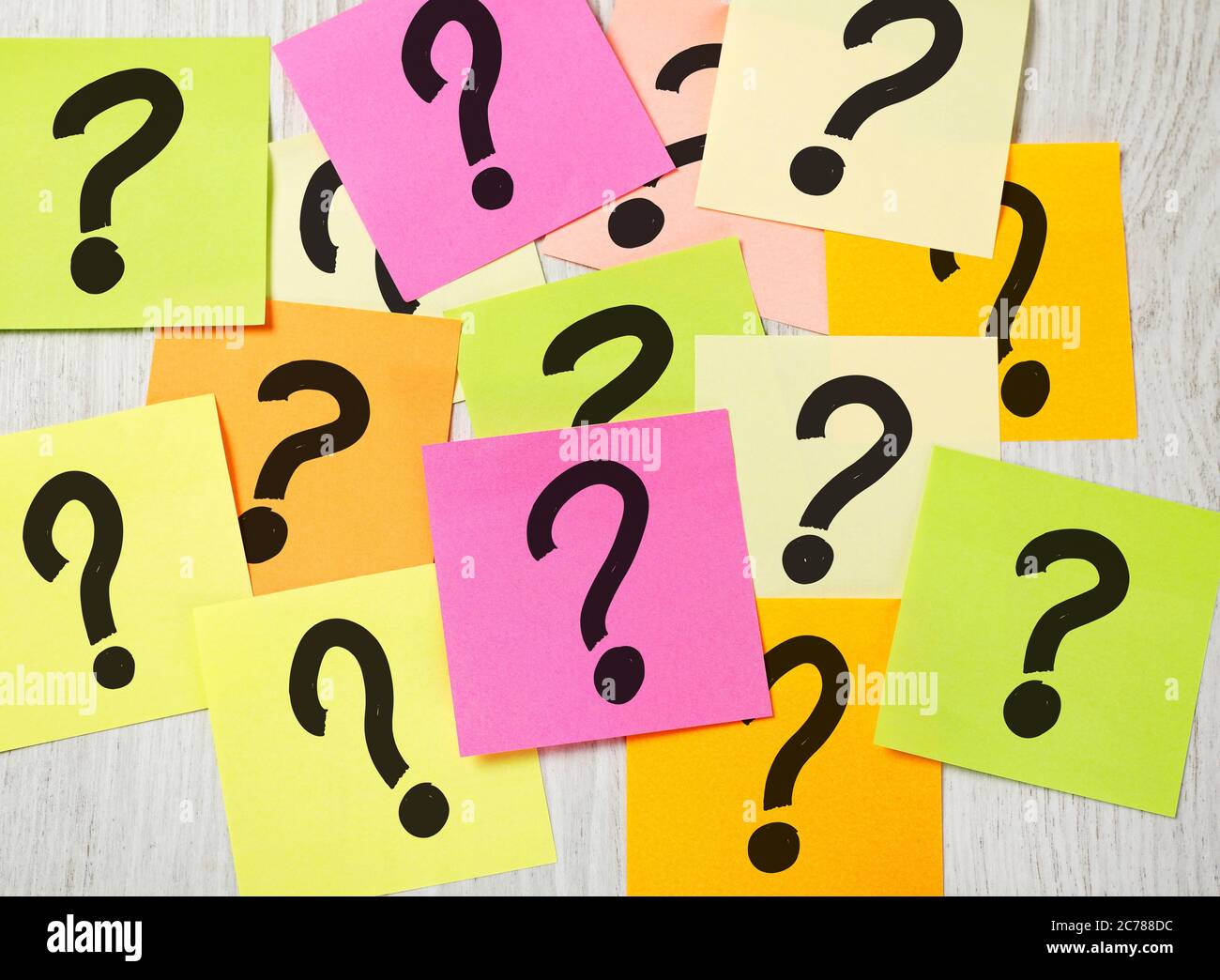 Question marks on adhesive notes Stock Photo - Alamy