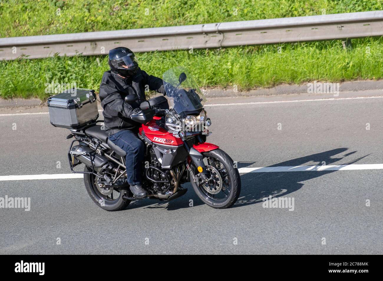 Triumph Tiger XRT; Motorbike rider; two wheeled transport, motorcycles ...