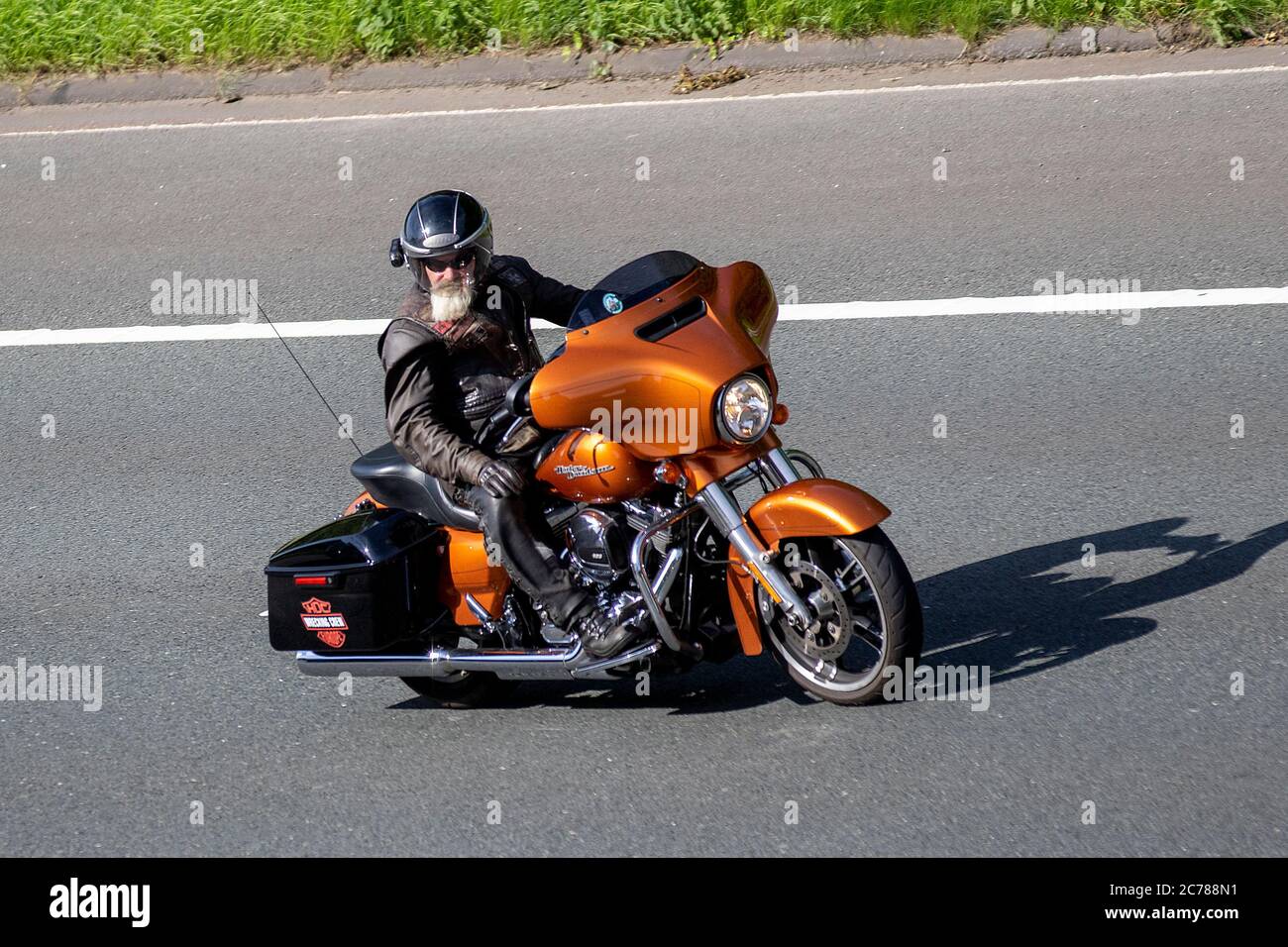 Orange Harley Davidson Wrecking Crew; Motorbike rider; two wheeled ...